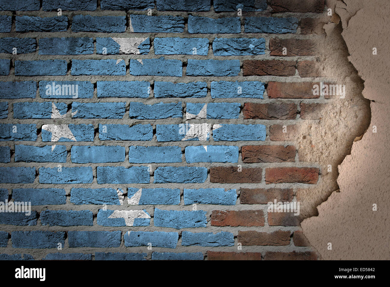 Dark brick wall texture with plaster - flag painted on wall ...