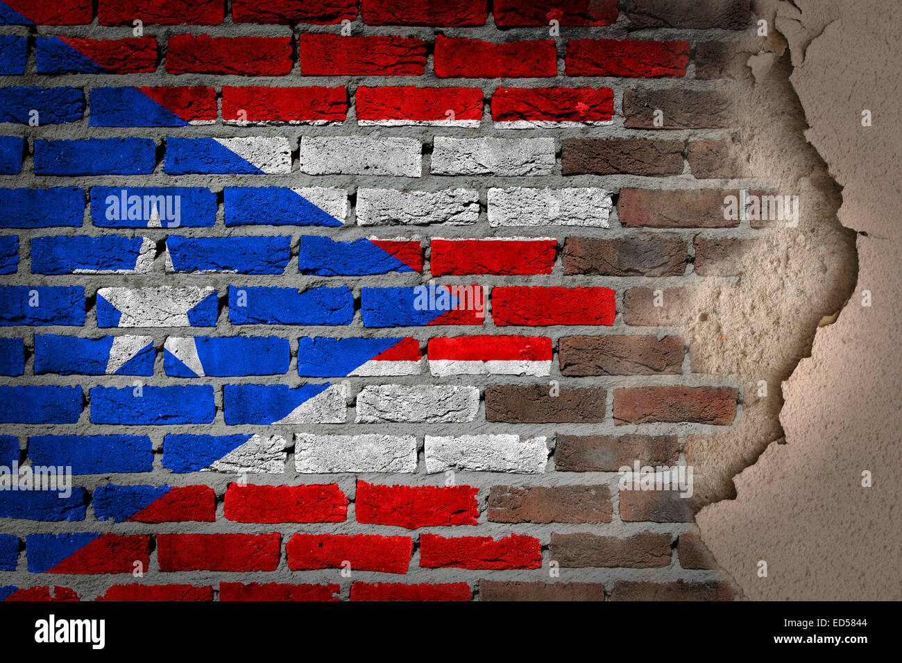 Dark brick wall texture with plaster - flag painted on wall - Puerto ...
