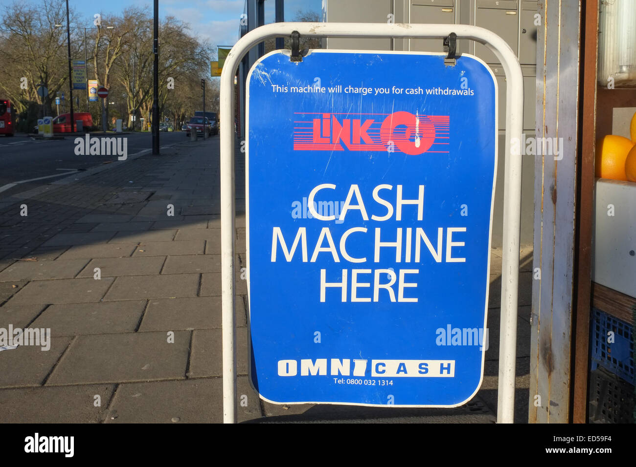 ATM Cash machine charging sign charge withdrawals UK Stock Photo - Alamy
