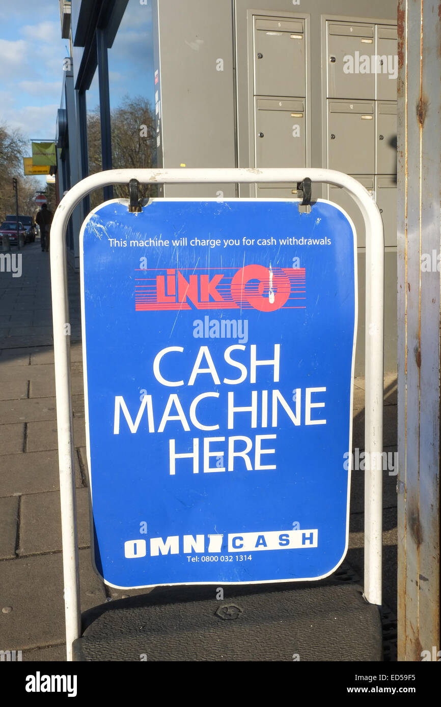ATM Cash machine charging sign charge withdrawals UK Stock Photo - Alamy