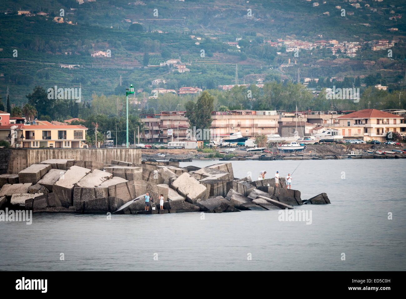 Pier of Riposto east Sicily at dawn Stock Photo - Alamy