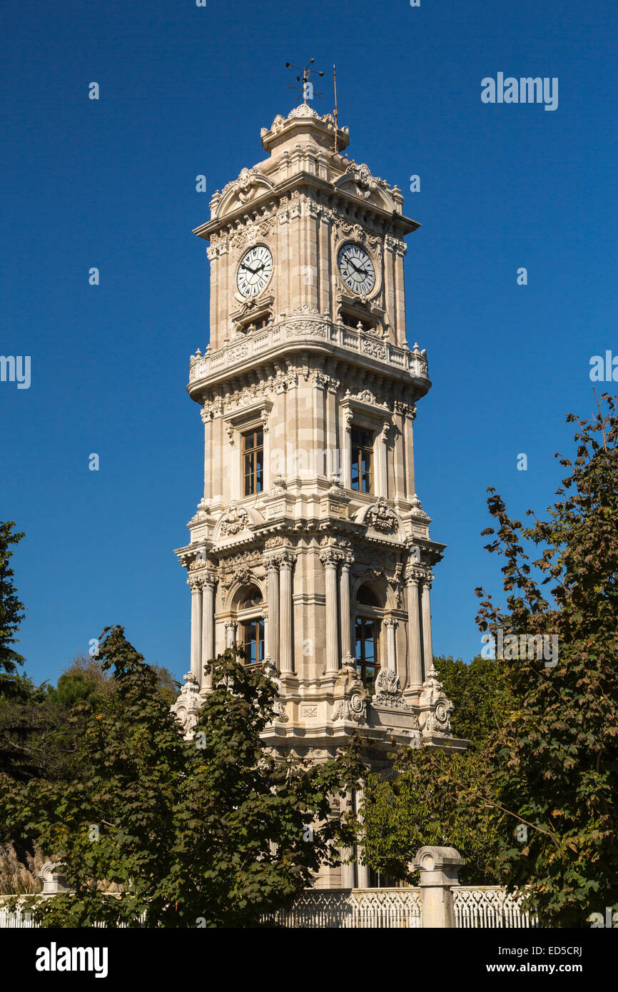 The ornate clock tower of the Dolmabahçe Palace in Istanbul, Turkey ...