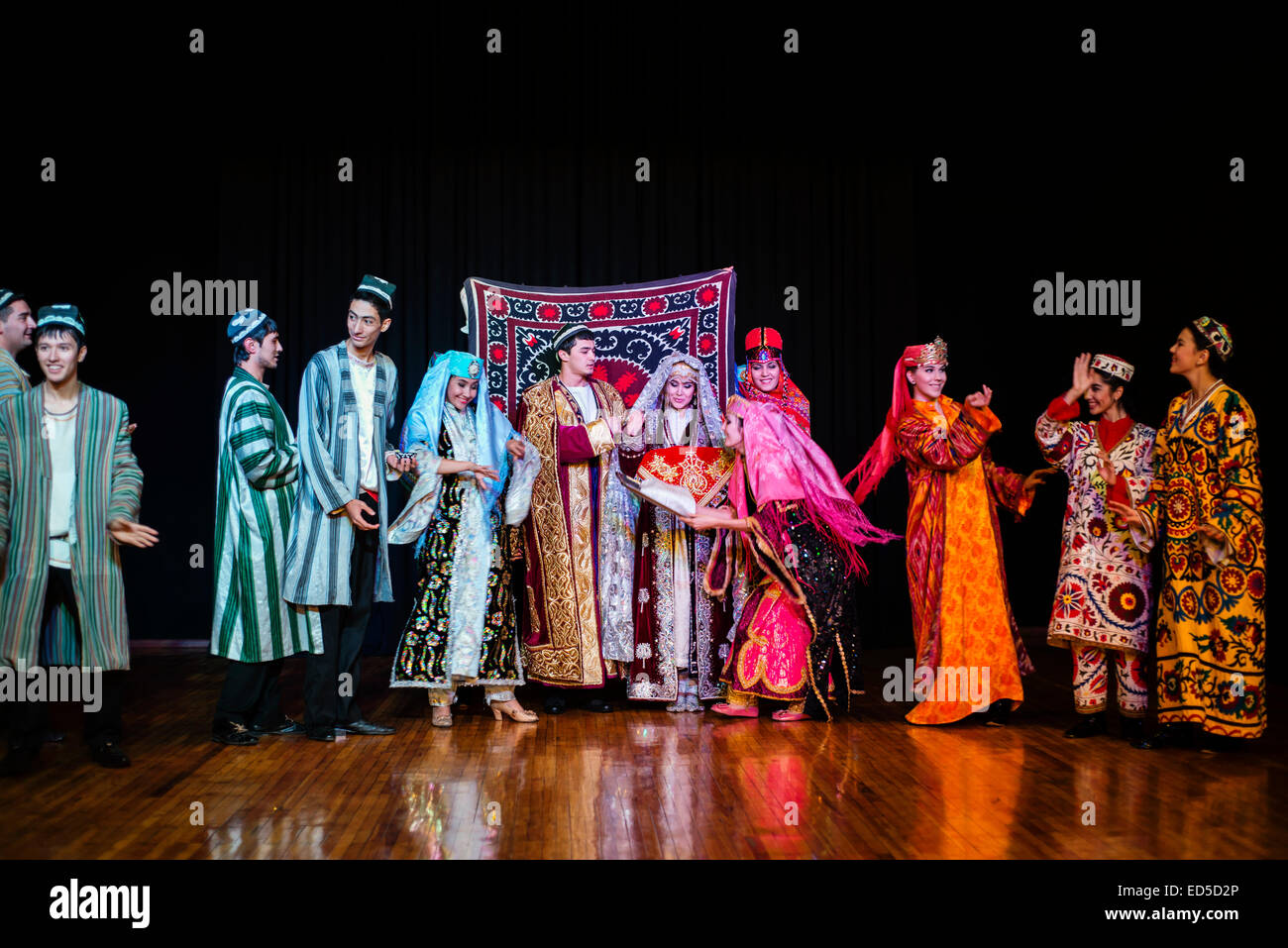 Actors in traditional Uzbek costume of 19 century perform wedding ...
