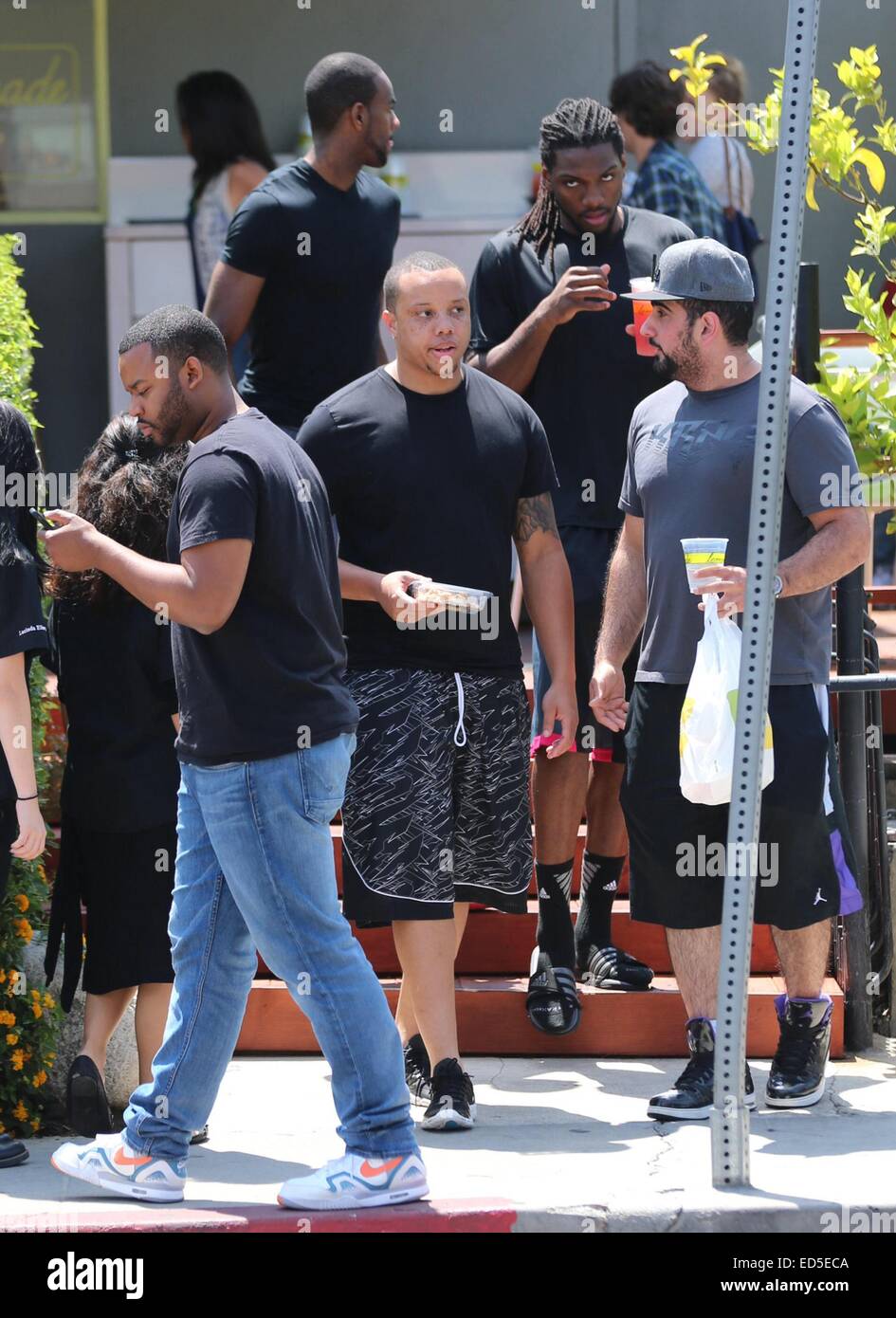 Kenneth Bernard leaving Lemonade with a group of friends after having ...