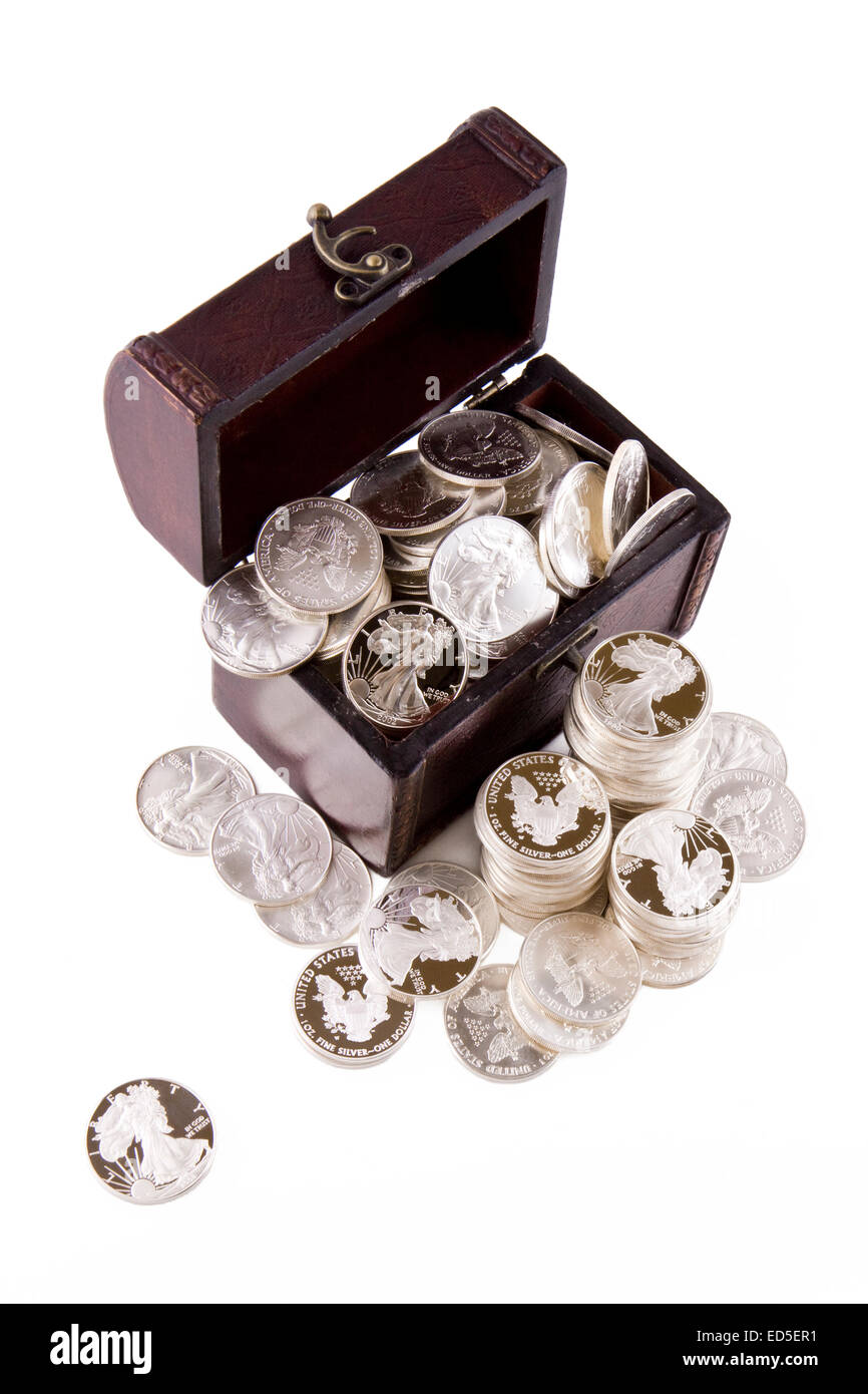 Old case full of silver coins, isolated on white background Stock Photo ...