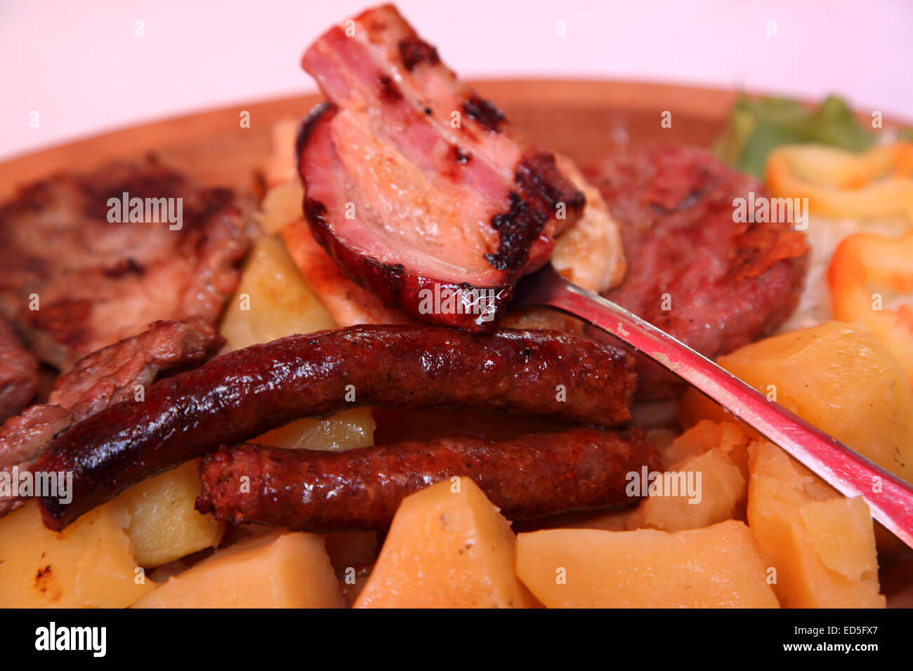 A traditional platter of grilled meat at the Znak Pitanja restaurant in ...