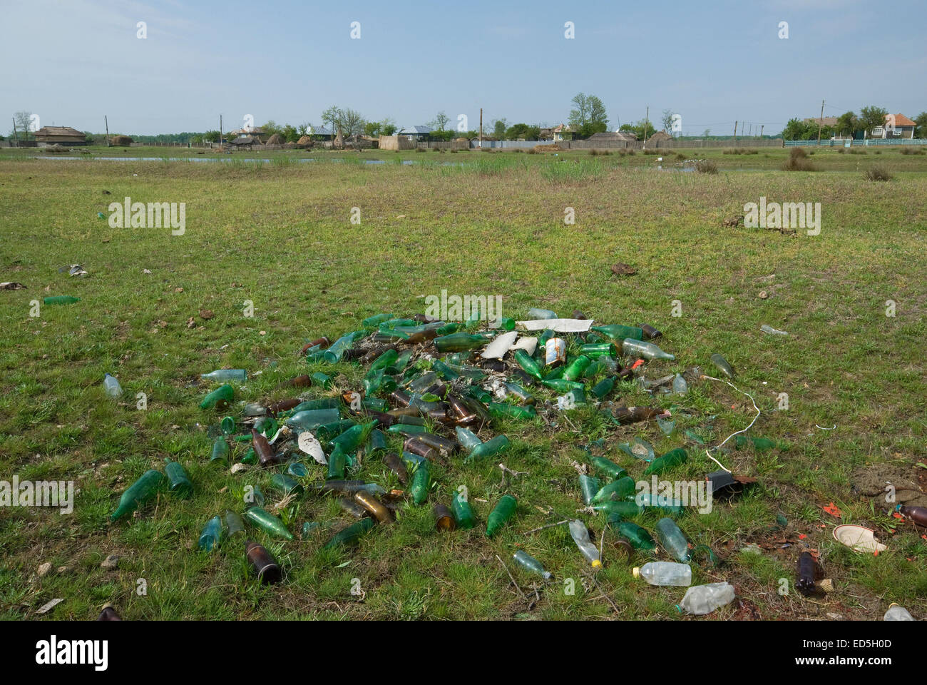 Garbage, waste glass bottles near the village of Caraoman, Danube delta ...