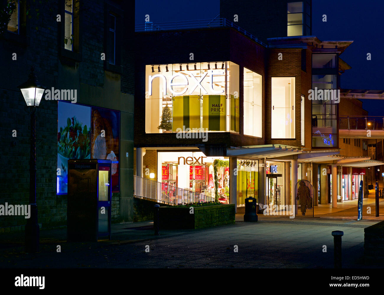 Next store at night, Burnley, Lancashire, England UK Stock Photo - Alamy