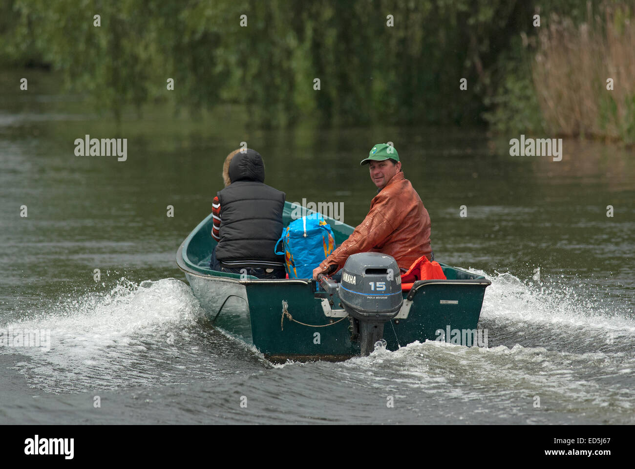 People in motorboat, Danube delta, Unesco World Heritage Site, Romania ...