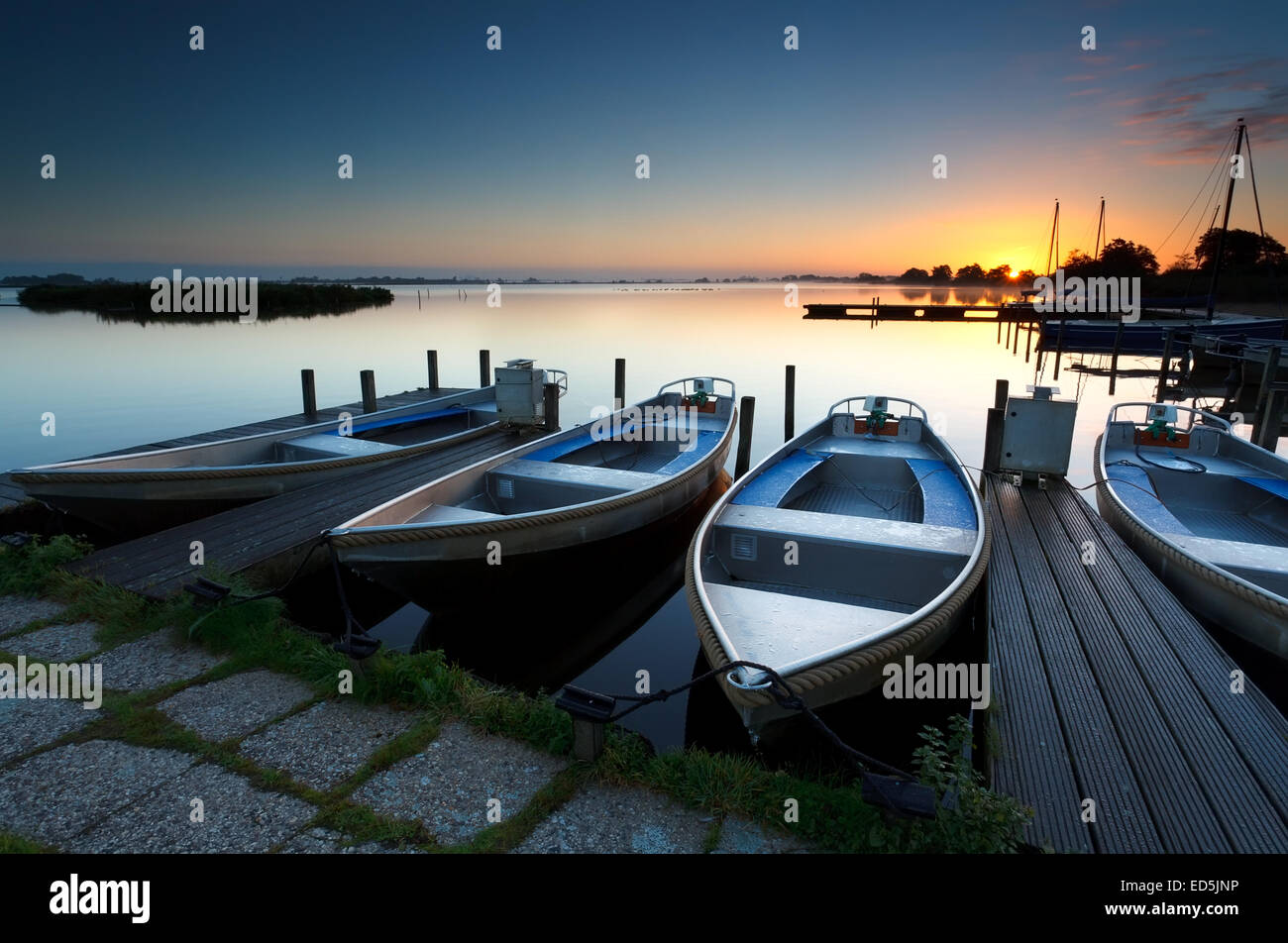 sunrise on lake harbor with boats, Netherlands Stock Photo - Alamy