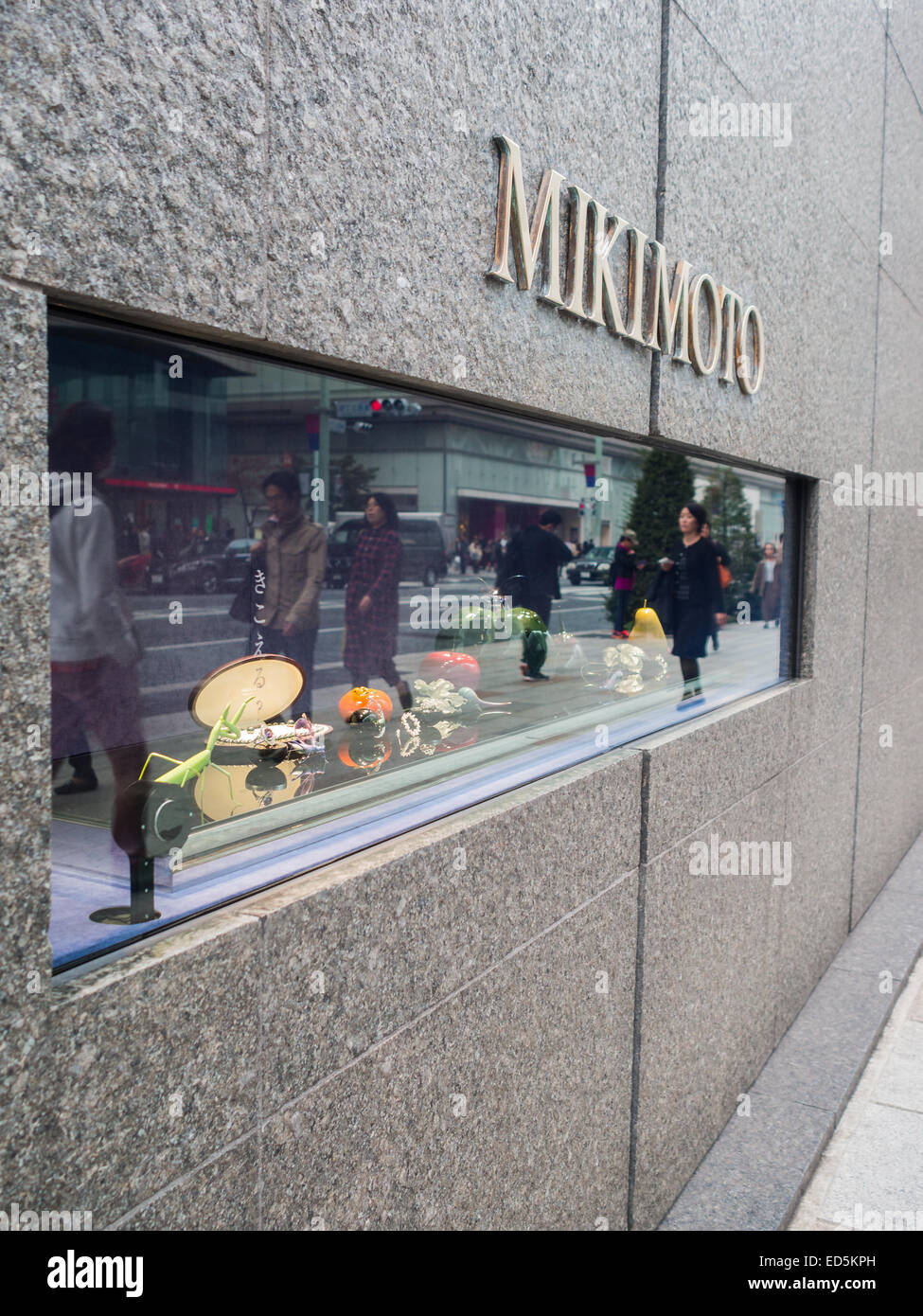 Ginza street shop window with pedestrians reflected in the glass Stock ...