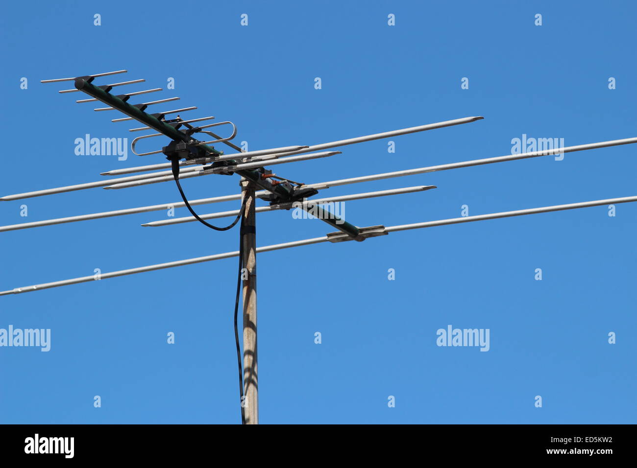 Television Antenna Against Blue Sky Stock Photo - Alamy