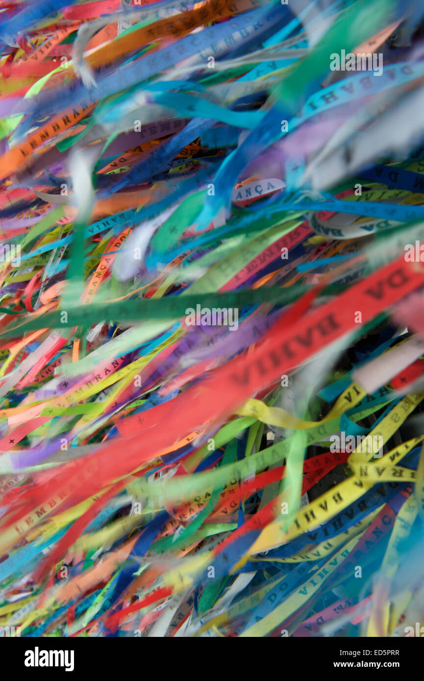 Wind blowing wish ribbons tied to a gate at the famous Igreja Nosso ...