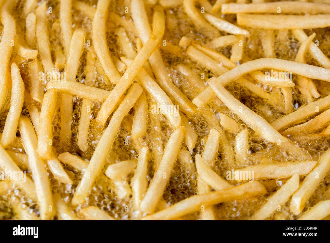 cooking french fries with oil Stock Photo - Alamy