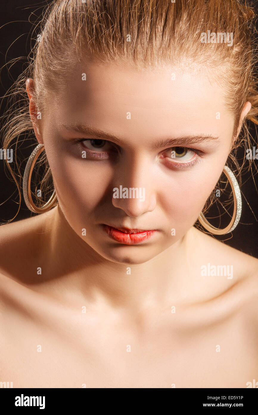 serious angry girl face looking at camera Stock Photo - Alamy