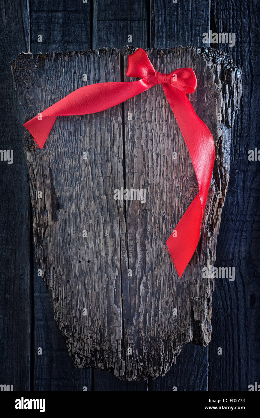 red ribbon on wooden background, festive background Stock Photo - Alamy