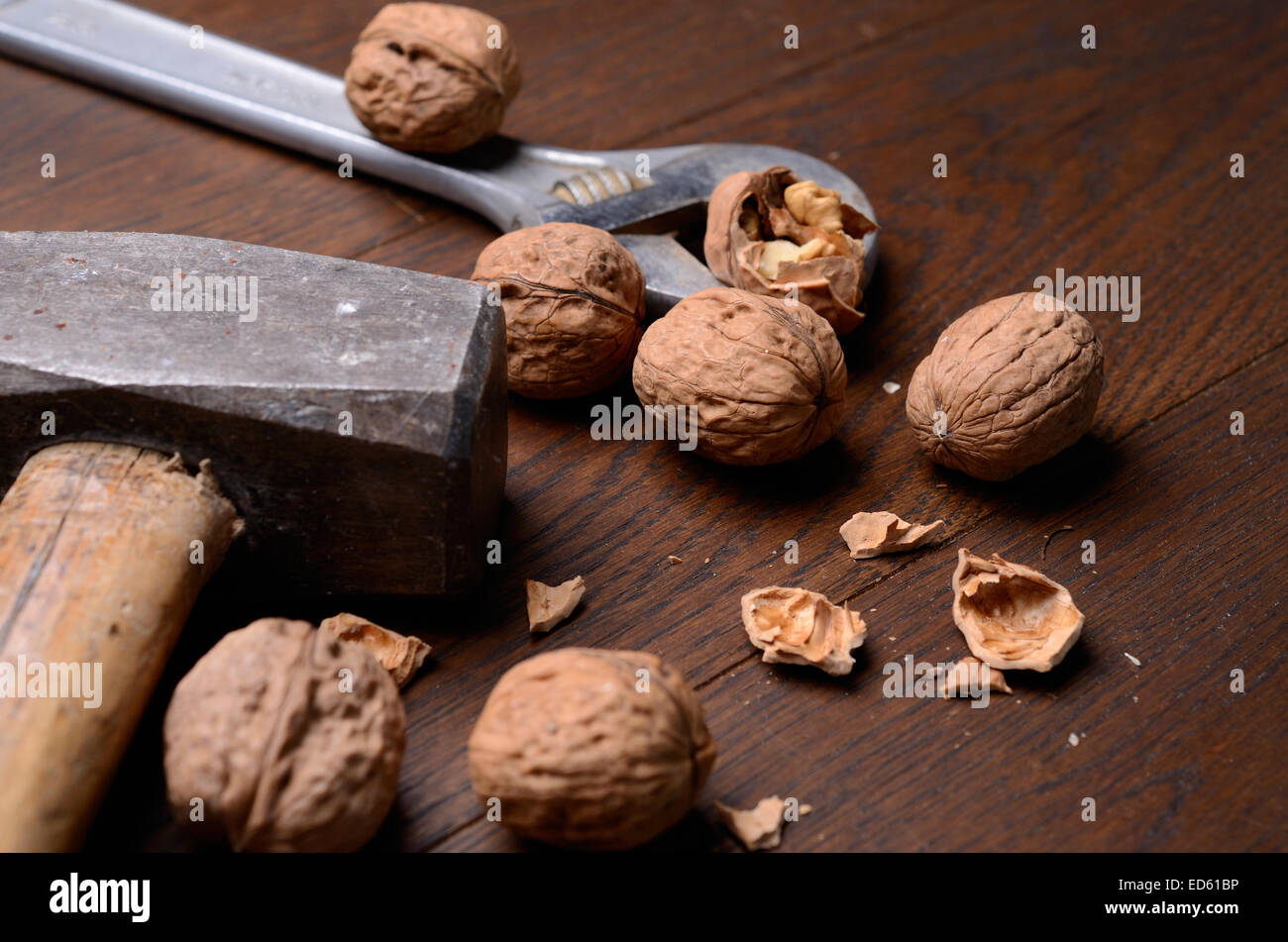 Wooden hammer cracking nuts hi-res stock photography and images - Alamy