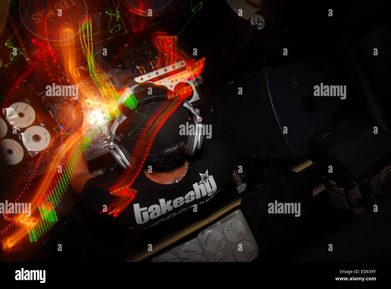 Disk jockey play music in DJ console at party Stock Photo - Alamy