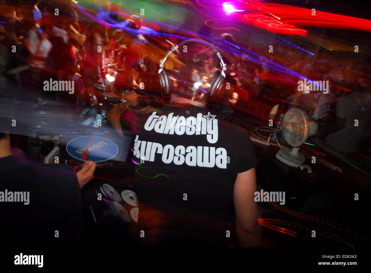 Disk jockey play music in DJ console at party Stock Photo - Alamy