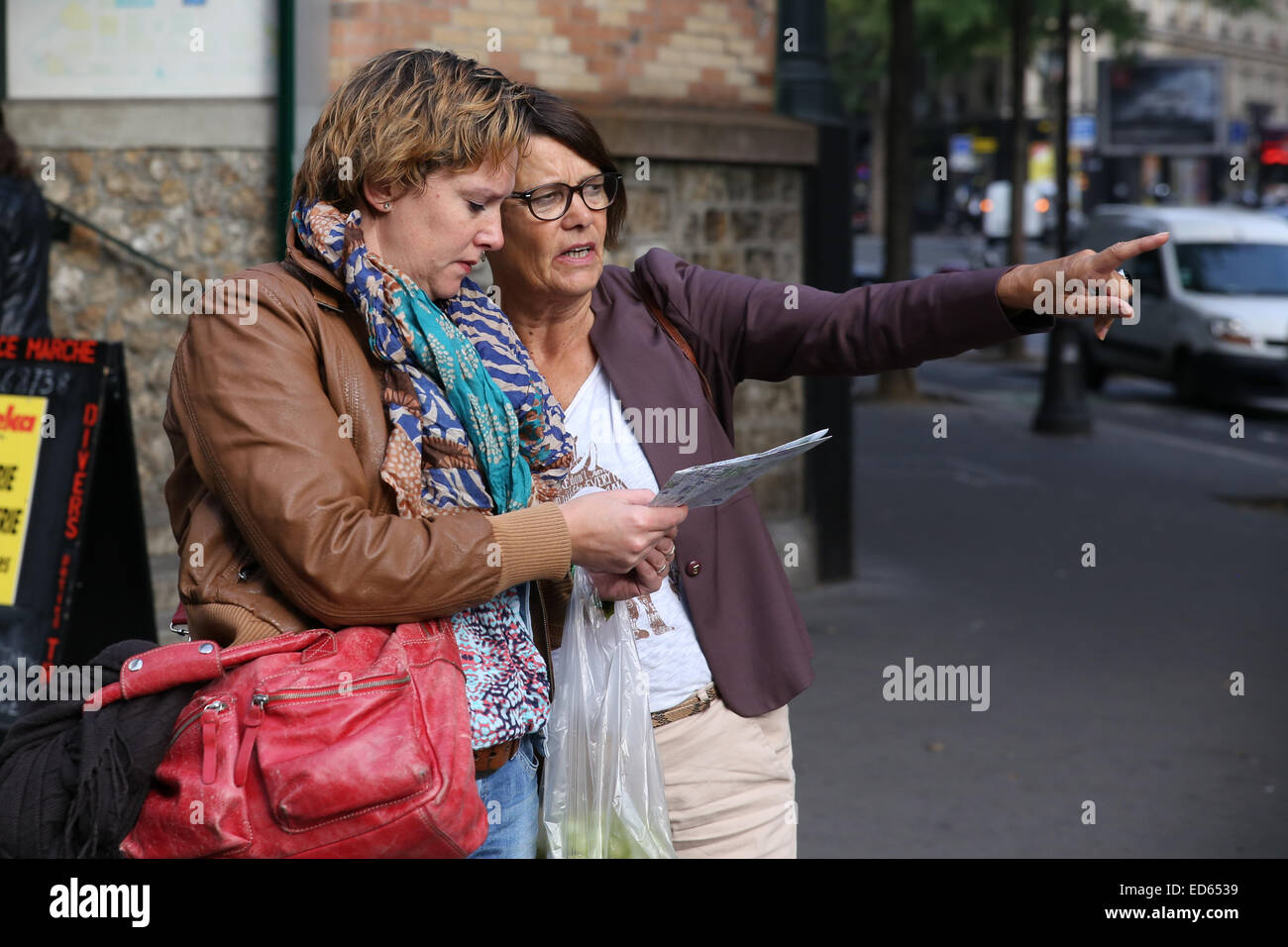 Checking the map hi-res stock photography and images - Alamy