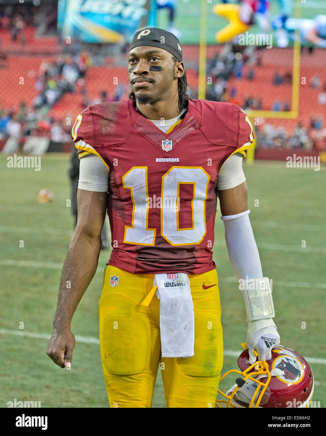 Washington Redskins quarterback Robert Griffin III (10) leaves the ...