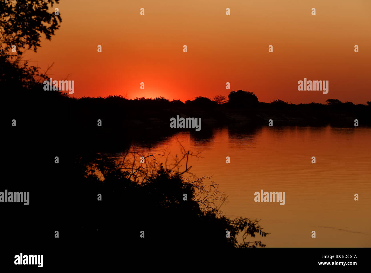 African sunset on Zambezi river, Caprivi region, Namibia Stock Photo ...