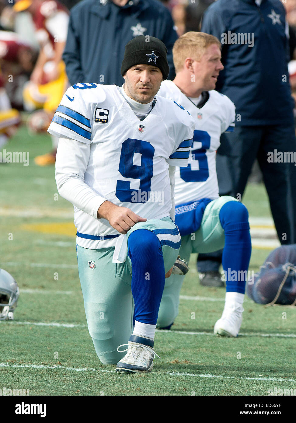 Dallas Cowboys quarterback Tony Romo (9) participates in stretching ...