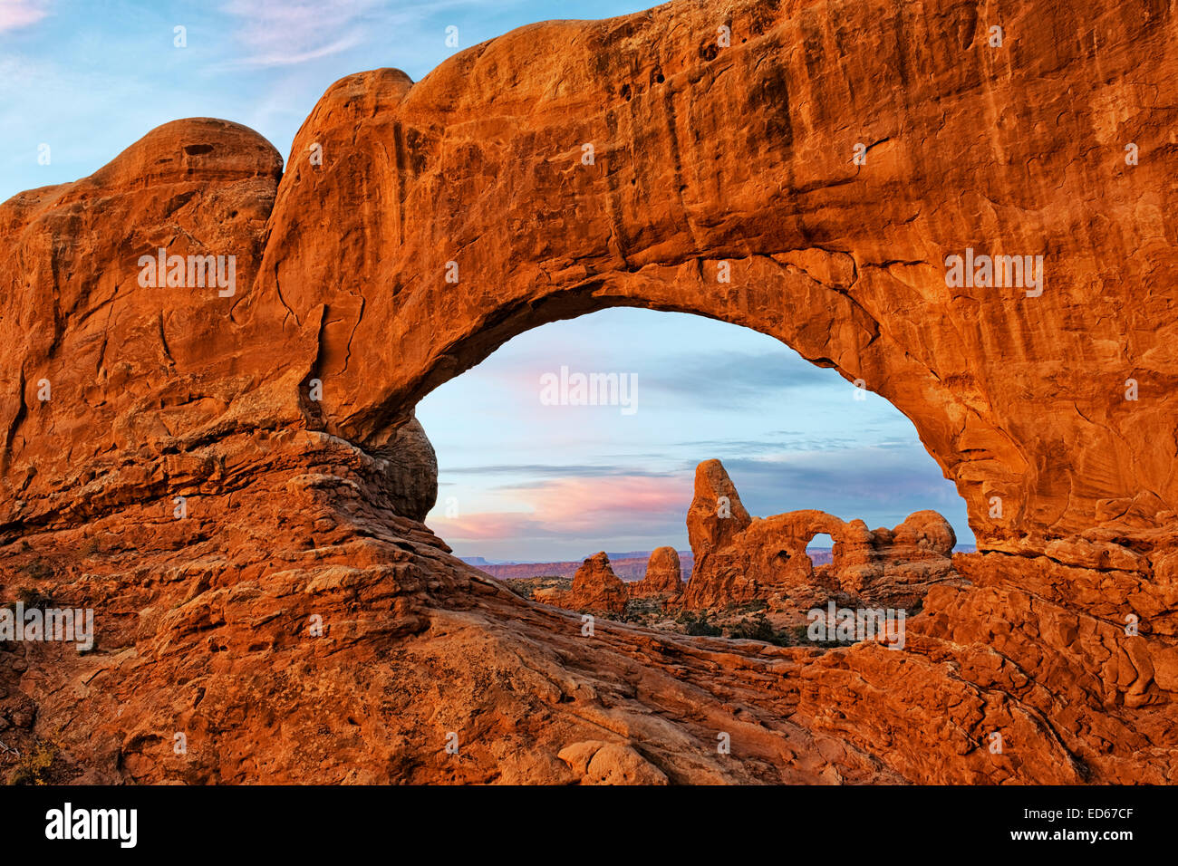 Turret Arch seen through North Window at first light in Utah’s Arches ...