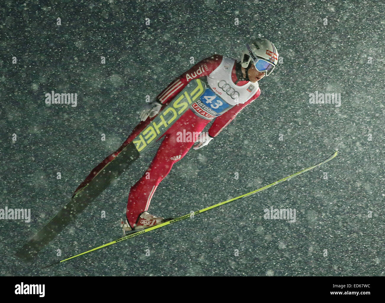 Oberstdorf, Germany. 29th Dec, 2014. Germany's Tim Fuchs soars through ...