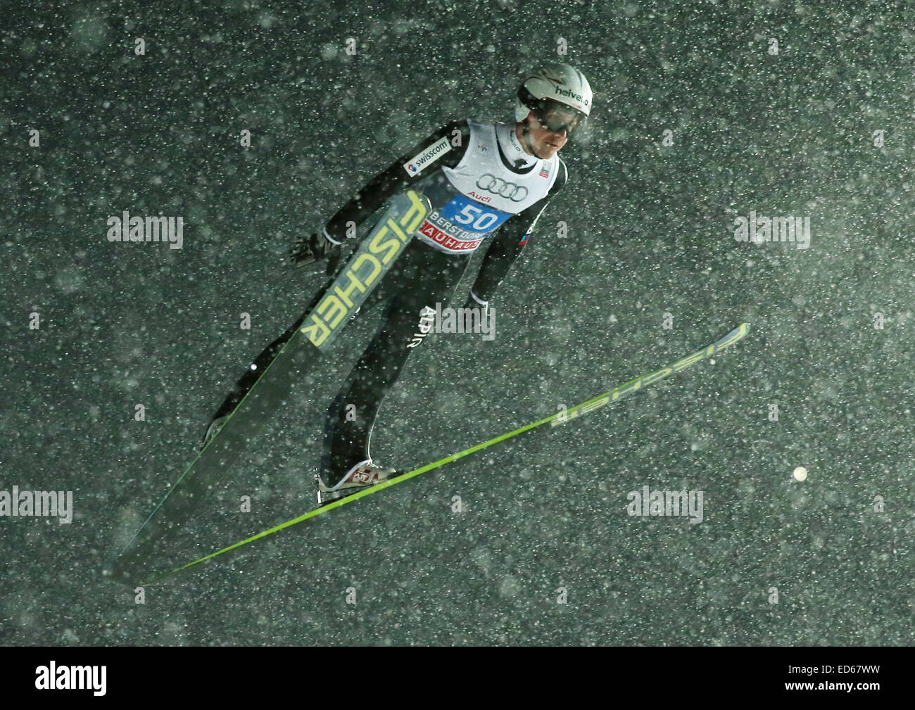 Oberstdorf, Germany. 29th Dec, 2014. Switzerland's Simon Amman soars ...