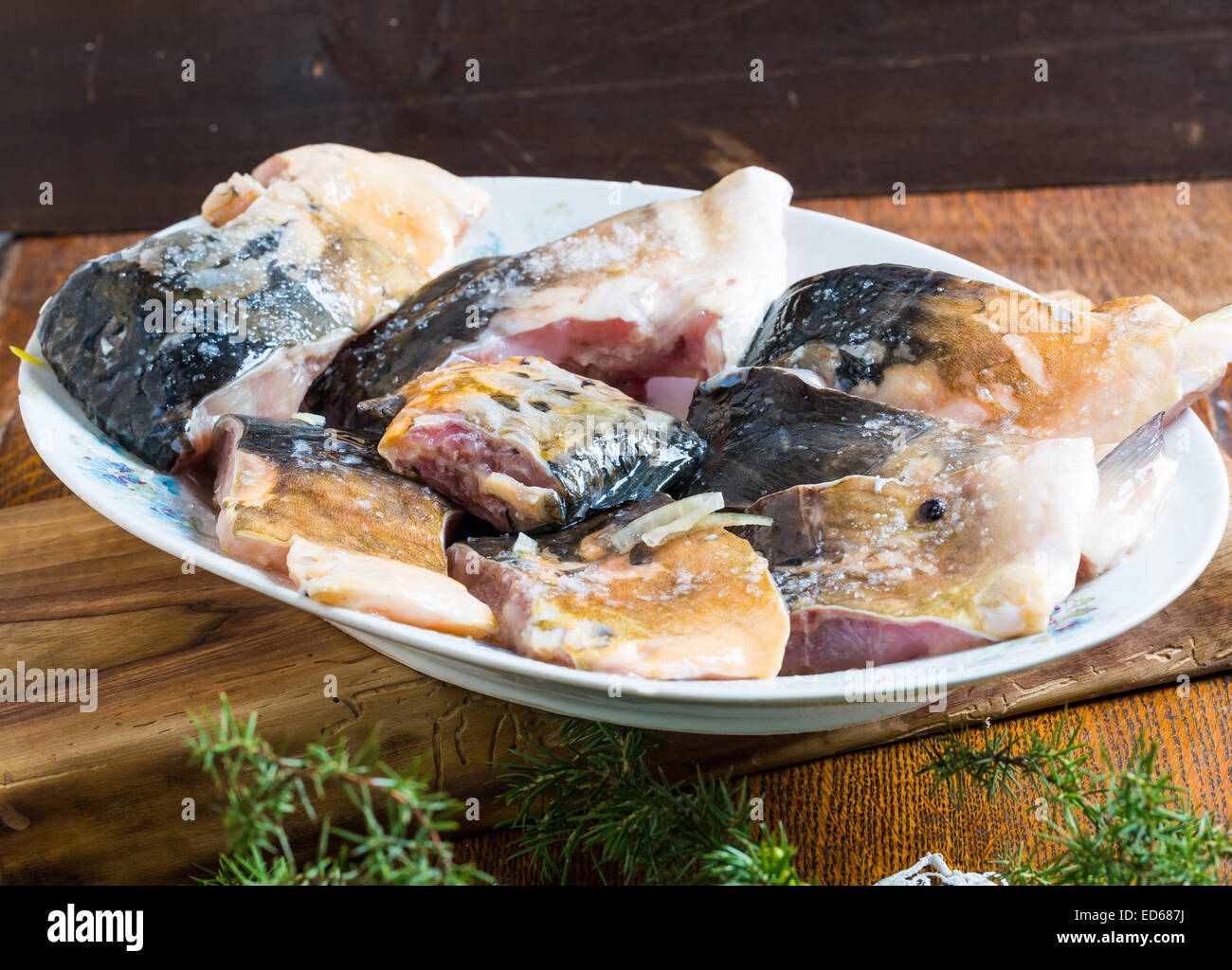 pieces of carp fish in marinade ready for frying Stock Photo - Alamy