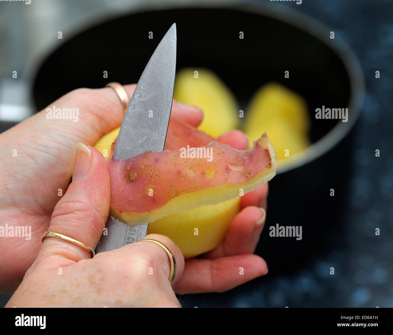 Peeling potato knife hi-res stock photography and images - Alamy