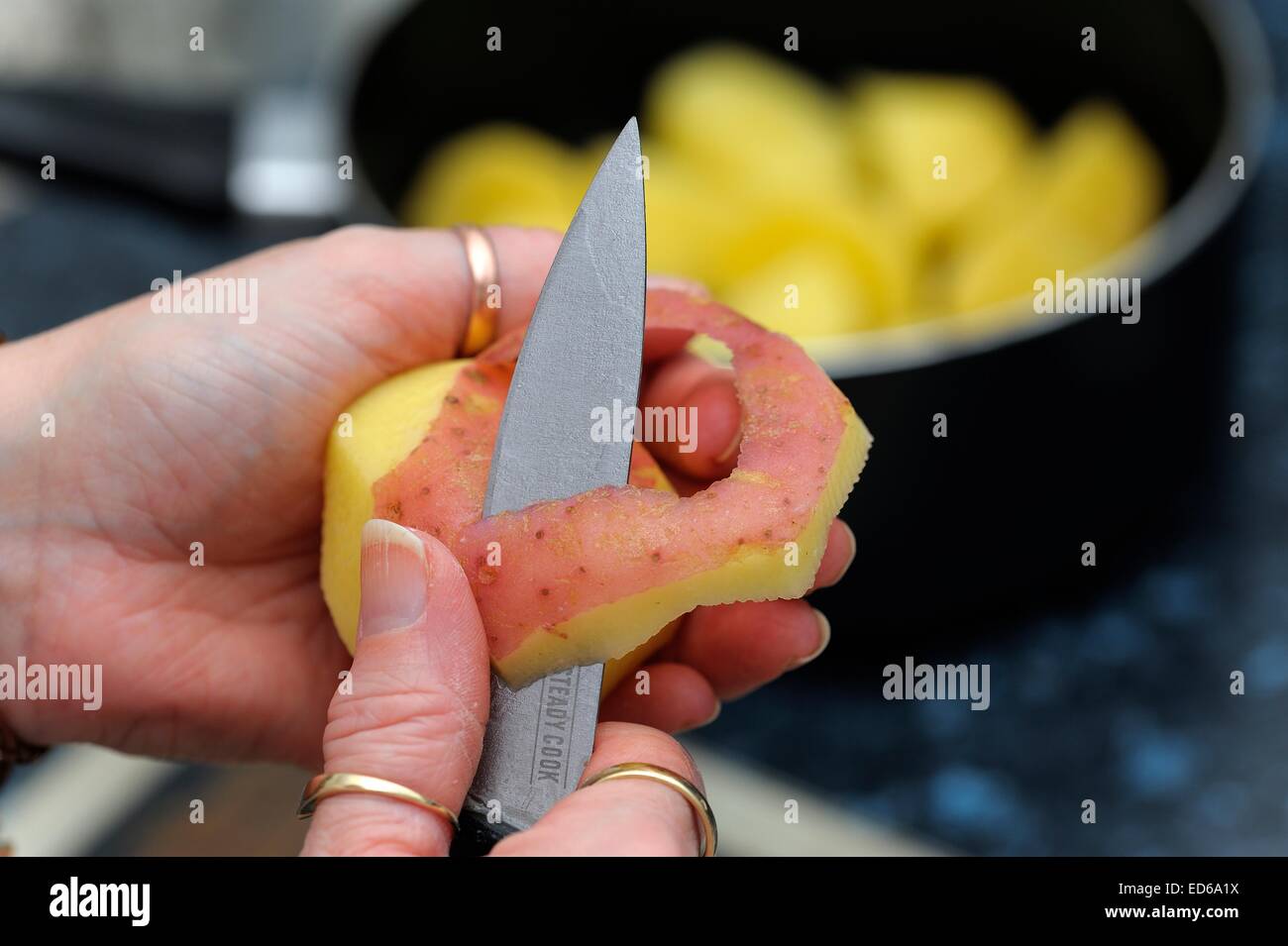 Peeling potato knife hi-res stock photography and images - Alamy