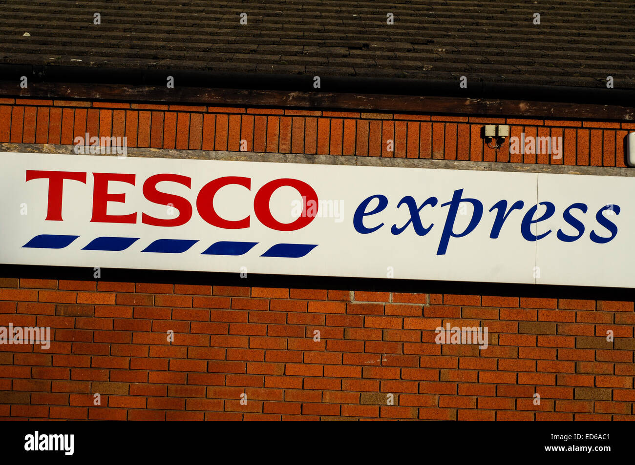 Tesco Express supermarket sign logo Stock Photo - Alamy