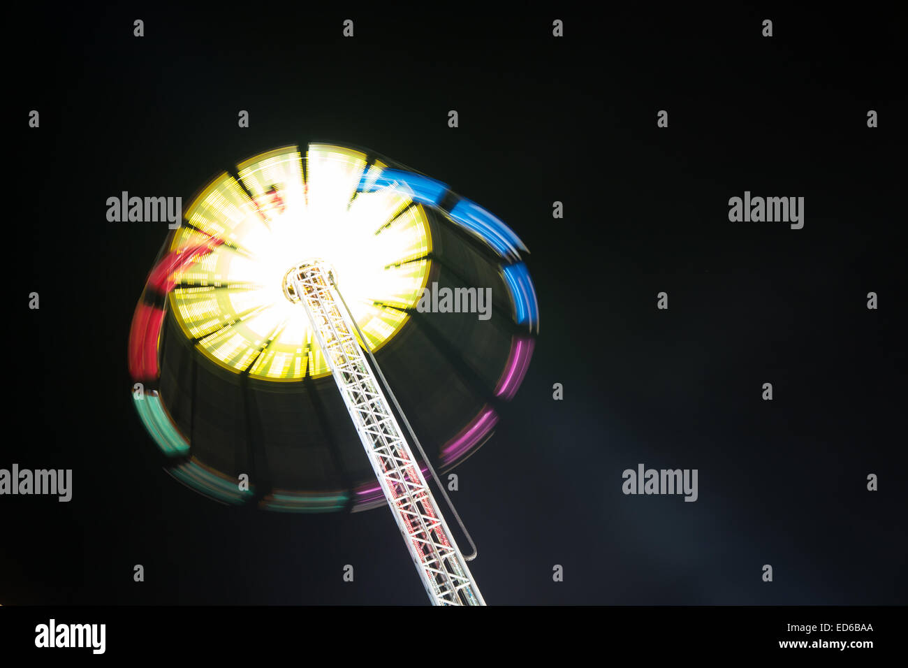 carousel on fair, lightpainting background Stock Photo - Alamy