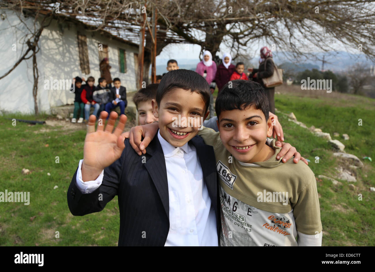 Ankara. 27th Dec, 2014. Two boys from Syria play in the Hatay refugee ...