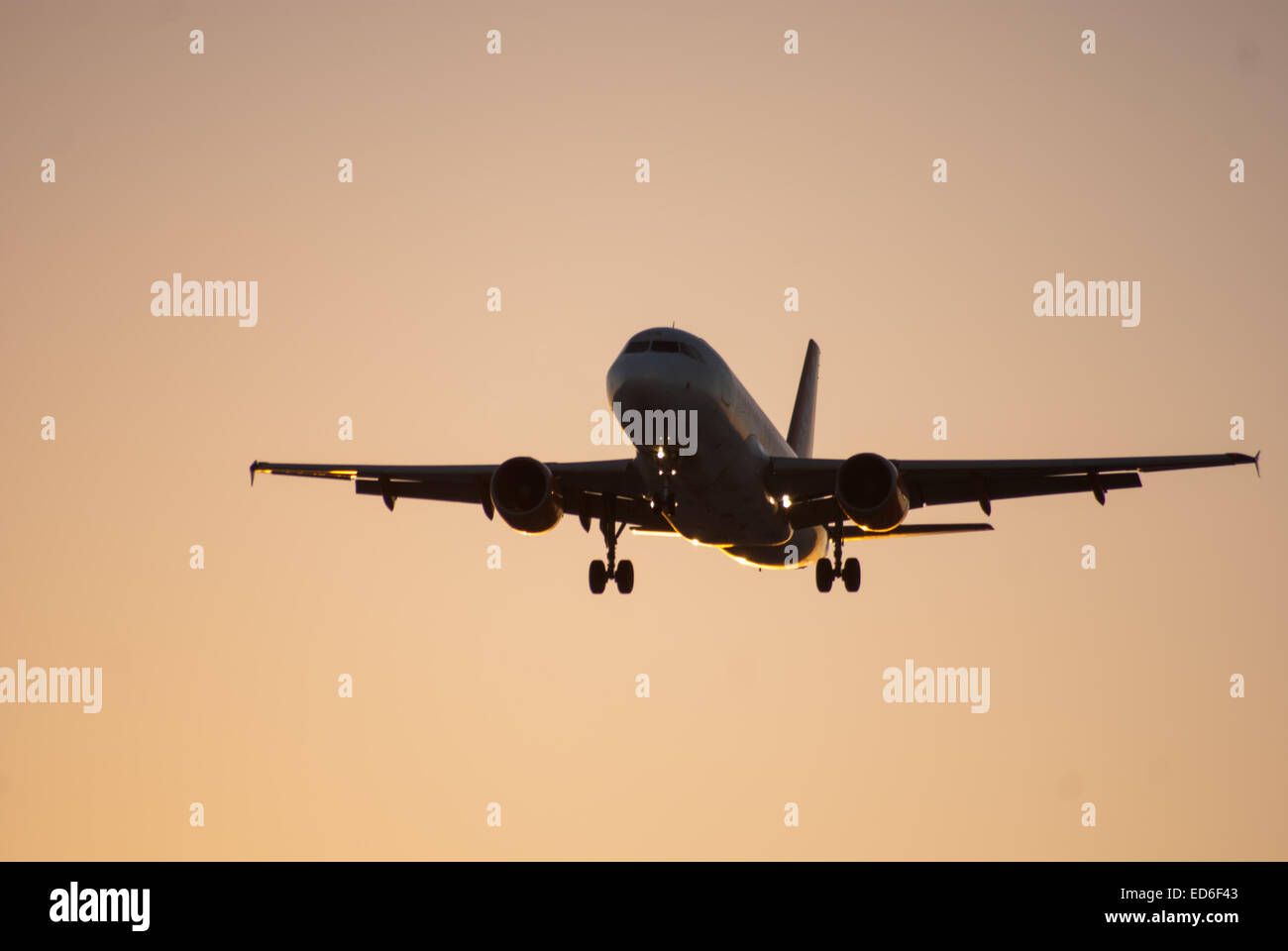 Airplane coming in to land at Edinburgh Airport. Edinburgh Airport is ...