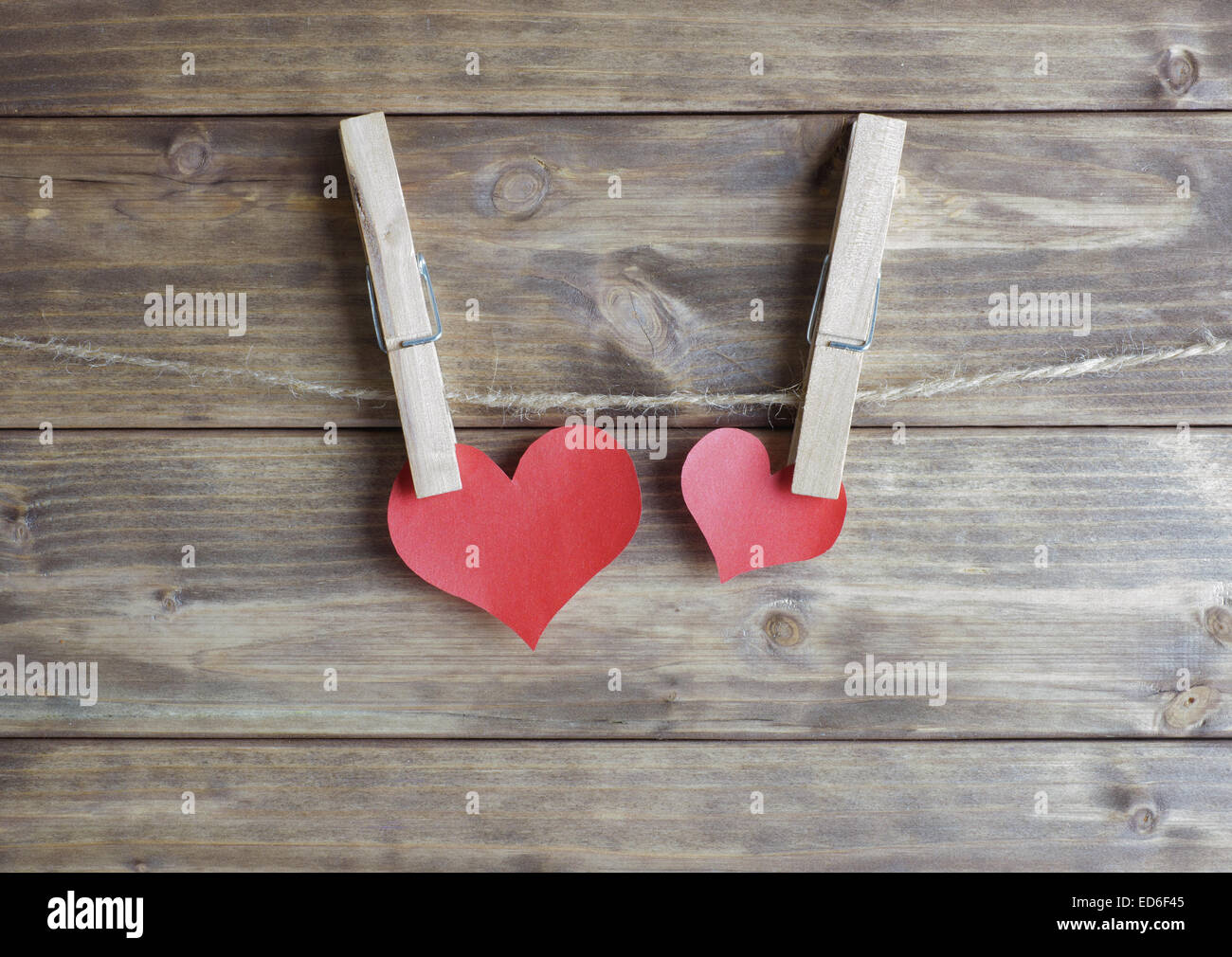 two red hearts hanging with clothespin on the rope. love concept Stock ...