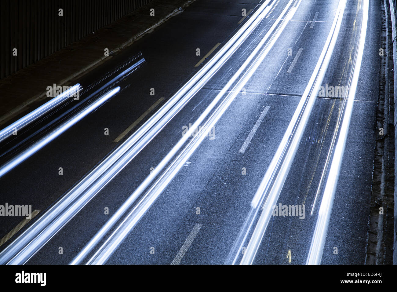 cars on highway in blue light Stock Photo - Alamy