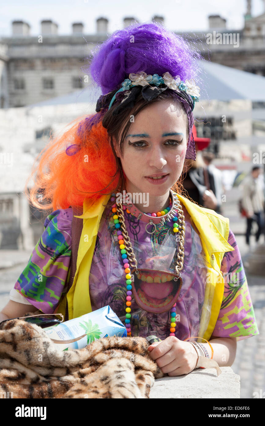 A fashionista presents her own street style fashion outside a runway ...