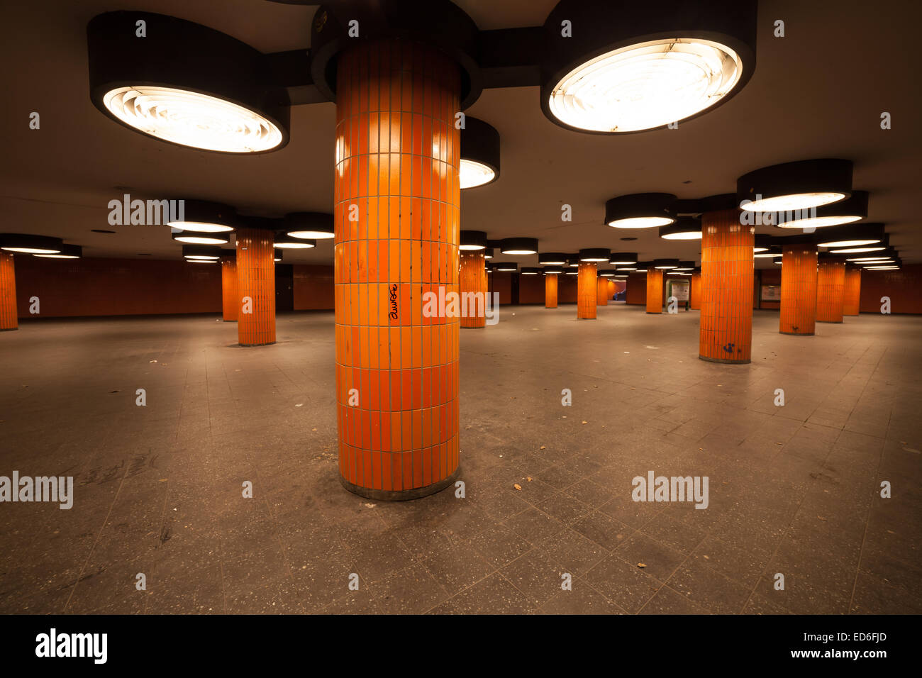 underpass in berlin with orange column Stock Photo - Alamy
