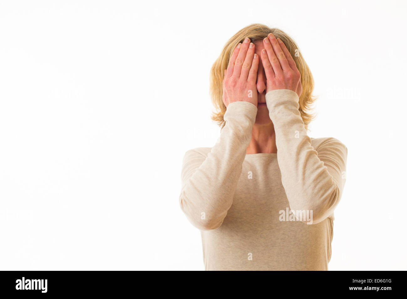 Shame and embarrassment : A forty year old caucasian woman hiding her ...