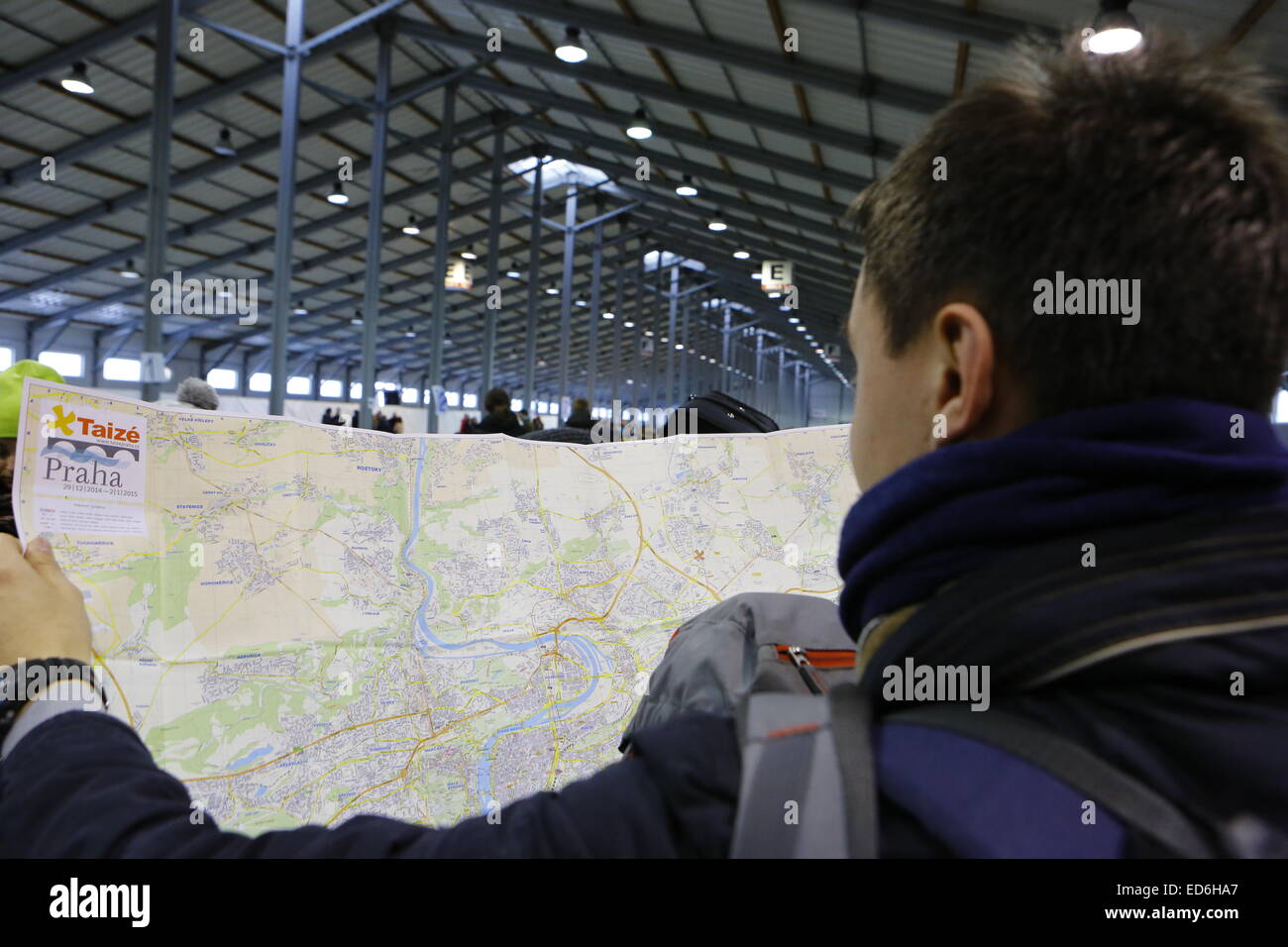 Prague, Czech Republic. 29th December 2014. A pilgrims checks the map ...