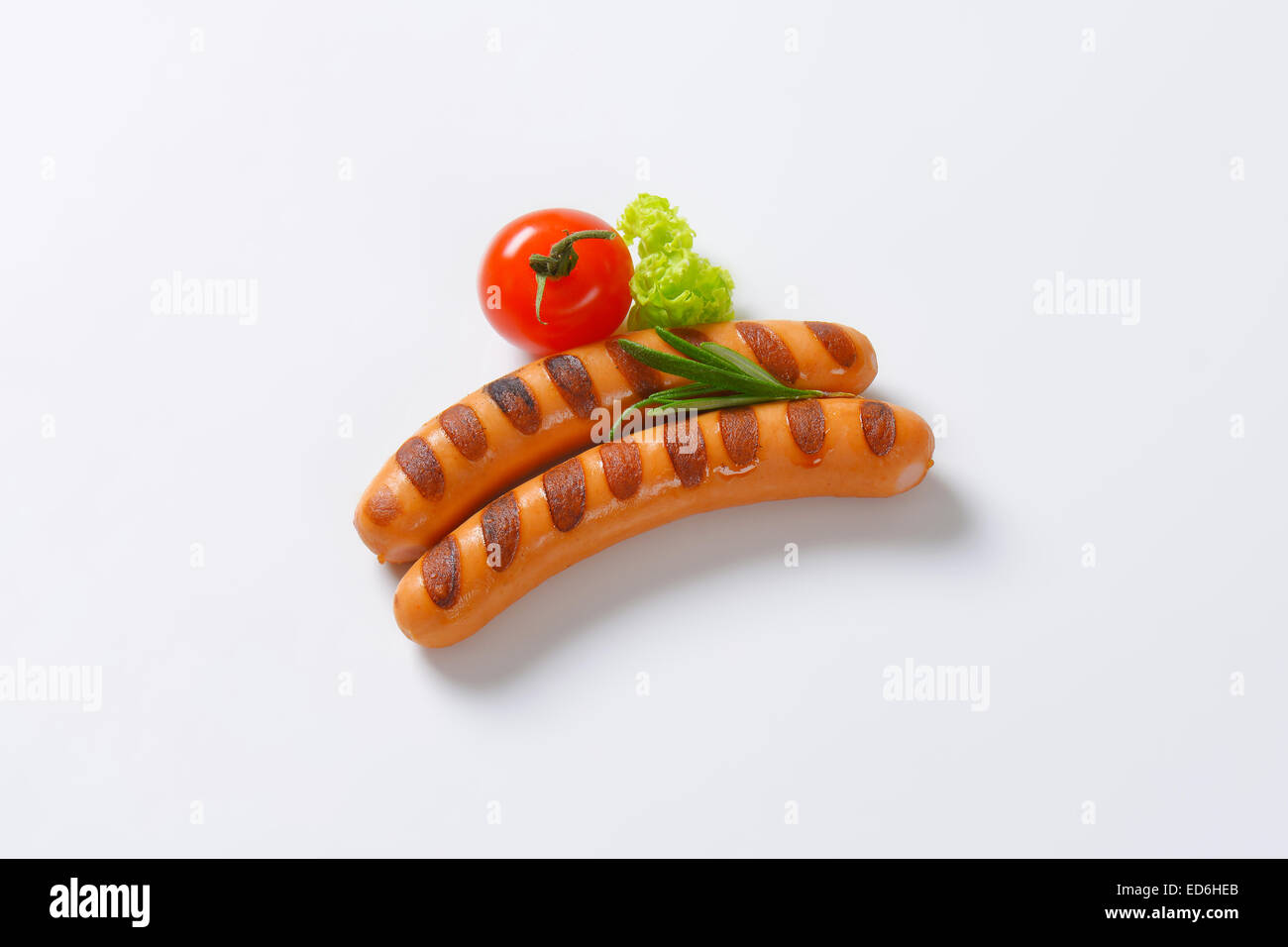 Grilled mini Vienna sausages - studio shot Stock Photo - Alamy