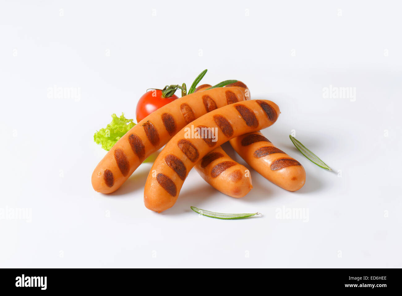 Grilled mini Vienna sausages - studio shot Stock Photo - Alamy