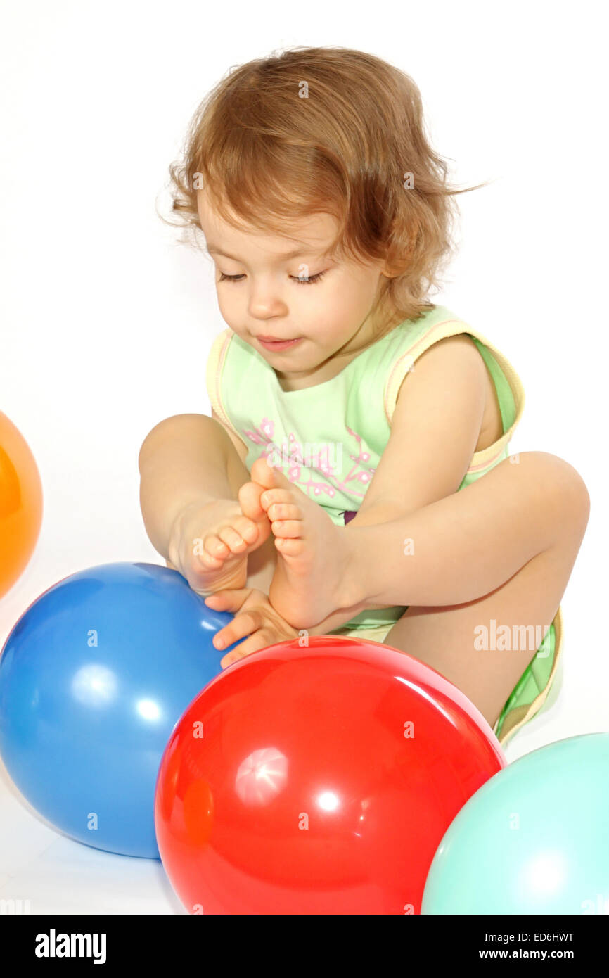 Little girl and balloons Stock Photo - Alamy
