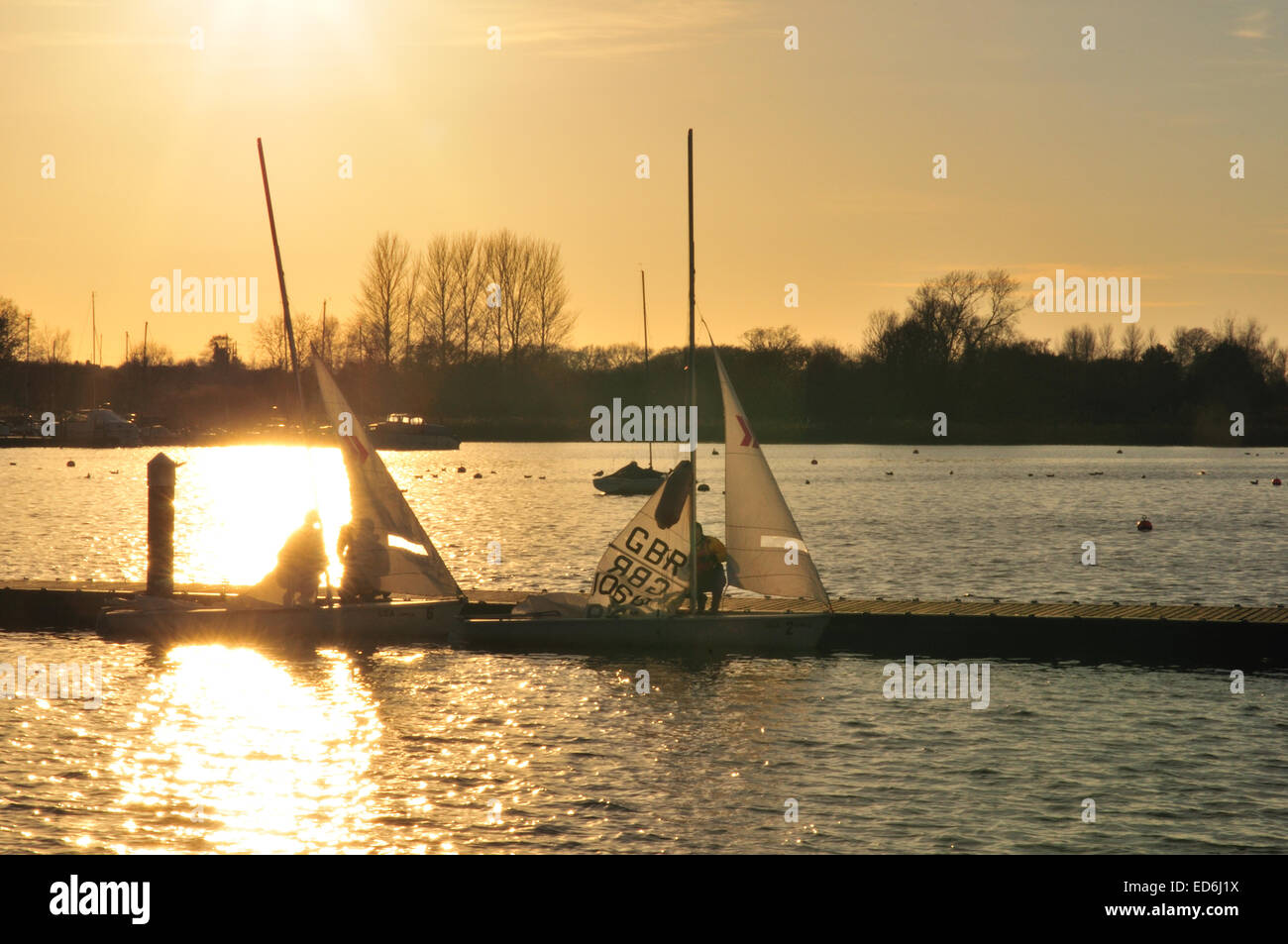 Men getting ready to go sailing Stock Photo - Alamy