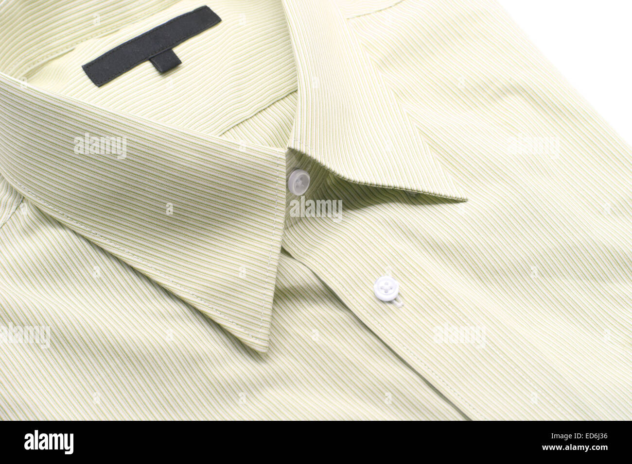 Close up view of a generic yellow business shirt with a line pattern ...