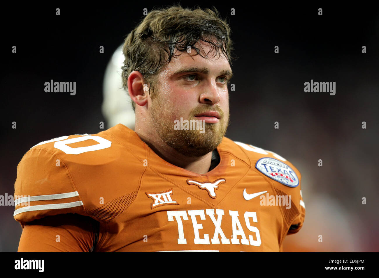 Houston, TX, USA. 29th Dec, 2014. Texas Longhorns center Jake Raulerson ...