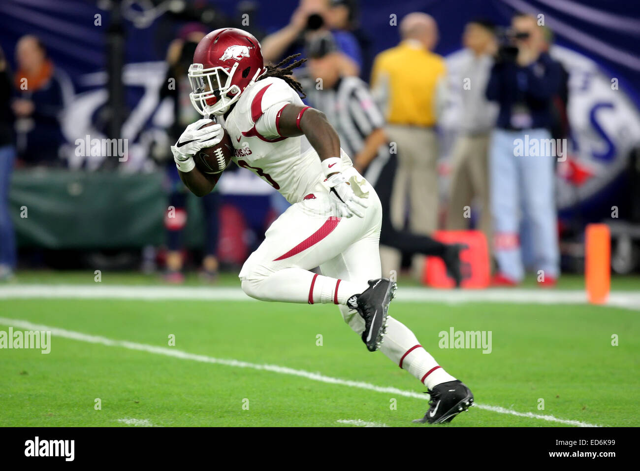 Houston, TX, USA. 29th Dec, 2014. Arkansas Razorbacks running back Alex ...